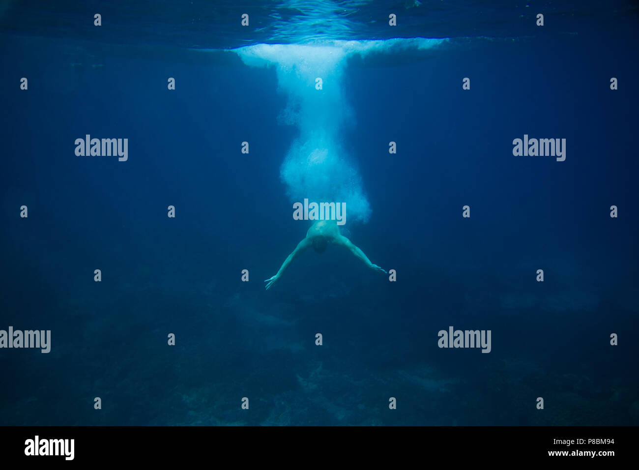 Man diving into ocean hi-res stock photography and images - Alamy