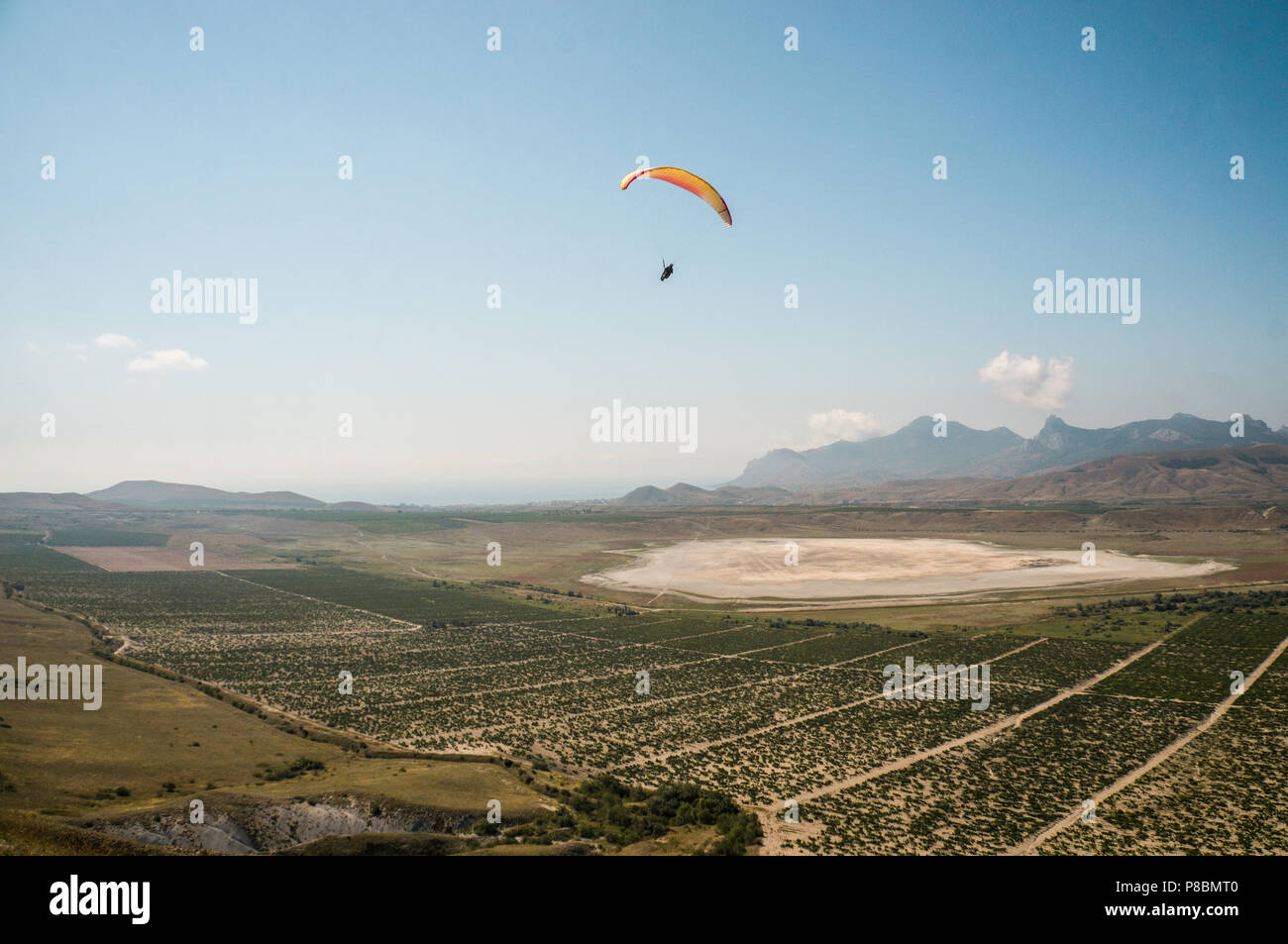 Person flying on paraplane hi-res stock photography and images - Alamy
