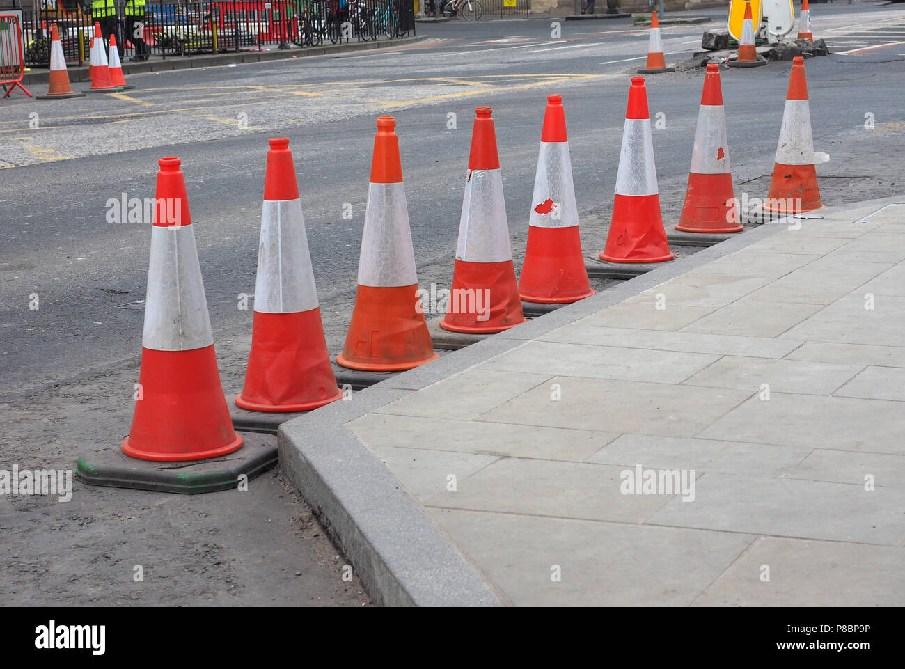 traffic cone to mark road works or temporary obstruction traffic sign ...
