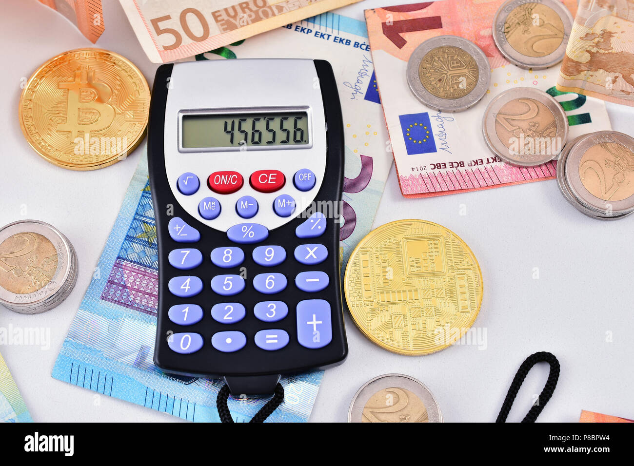 background with calculator, money, coins and virtual money Stock Photo ...