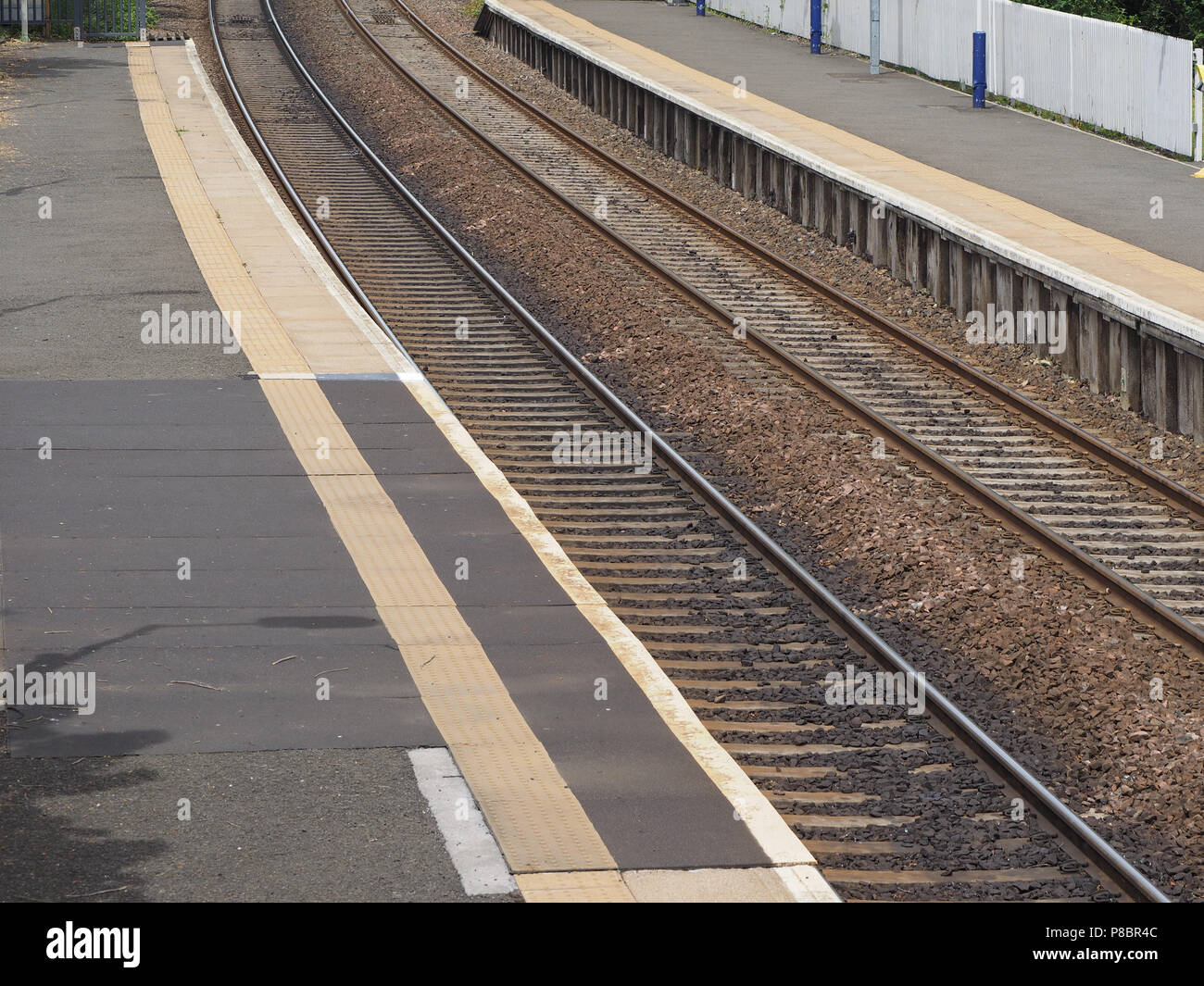 view of railroad railway station rails and platforms Stock Photo - Alamy
