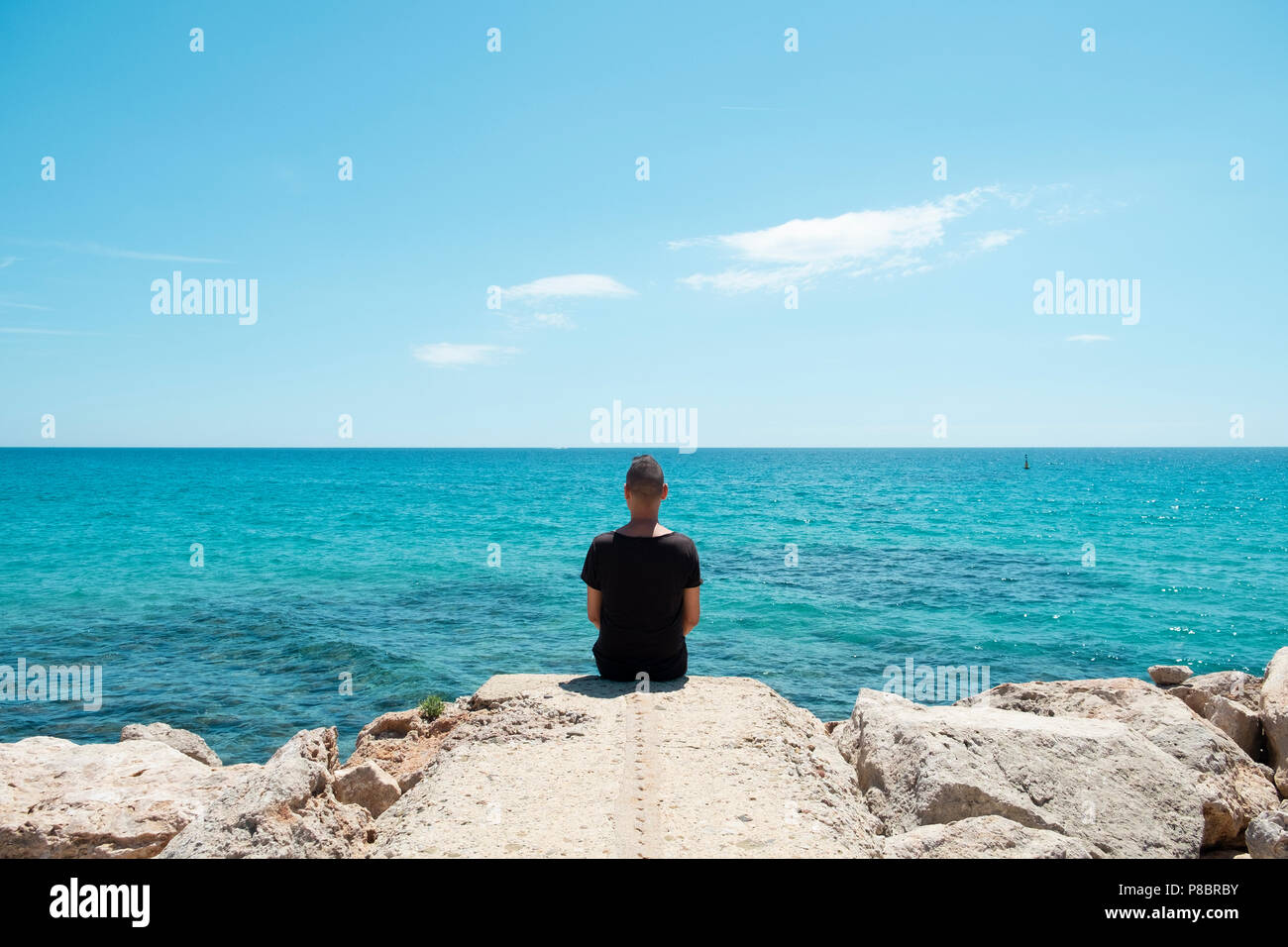 Man facing the sea hi-res stock photography and images - Alamy