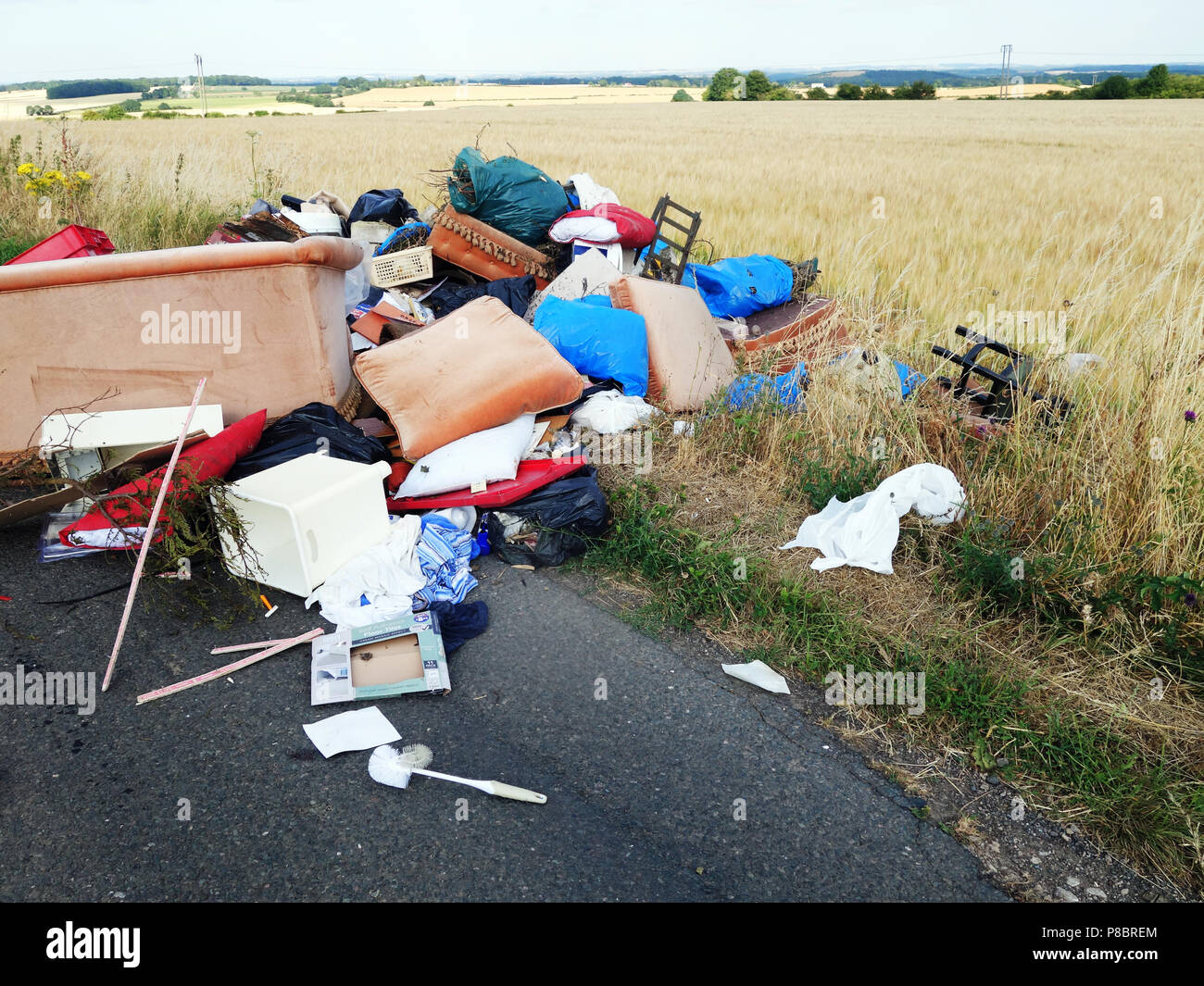 fly tipping uk. All over the road by back off loading household rubbish ...