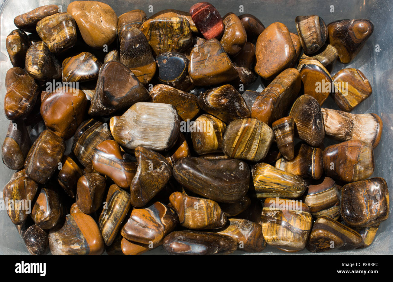 tiger's eye and hawk's eye gemstone as natural mineral rock specimen ...