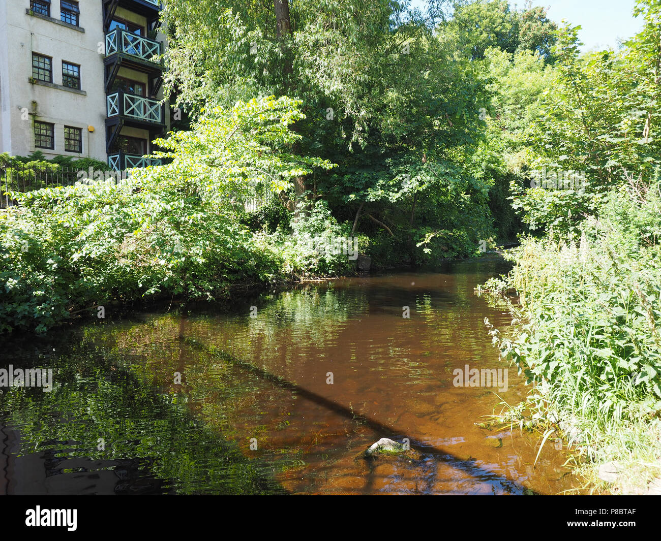 The Water of Leith river in Dean village in Edinburgh, UK Stock Photo ...