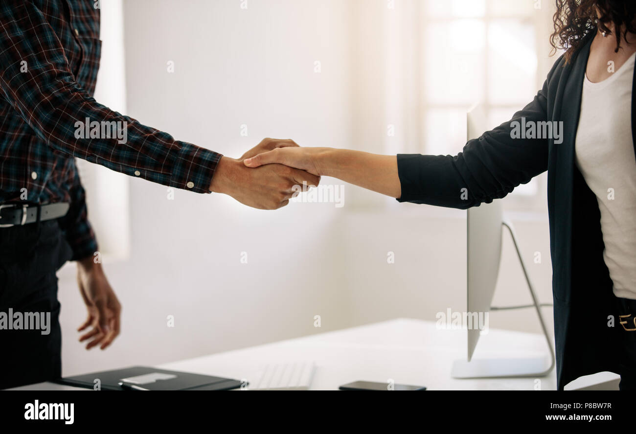 Business people greeting in office hi-res stock photography and images ...