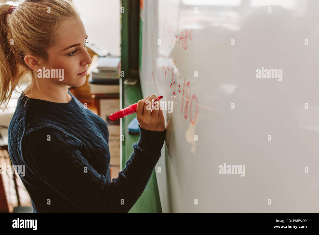 Female student maths hi-res stock photography and images - Alamy