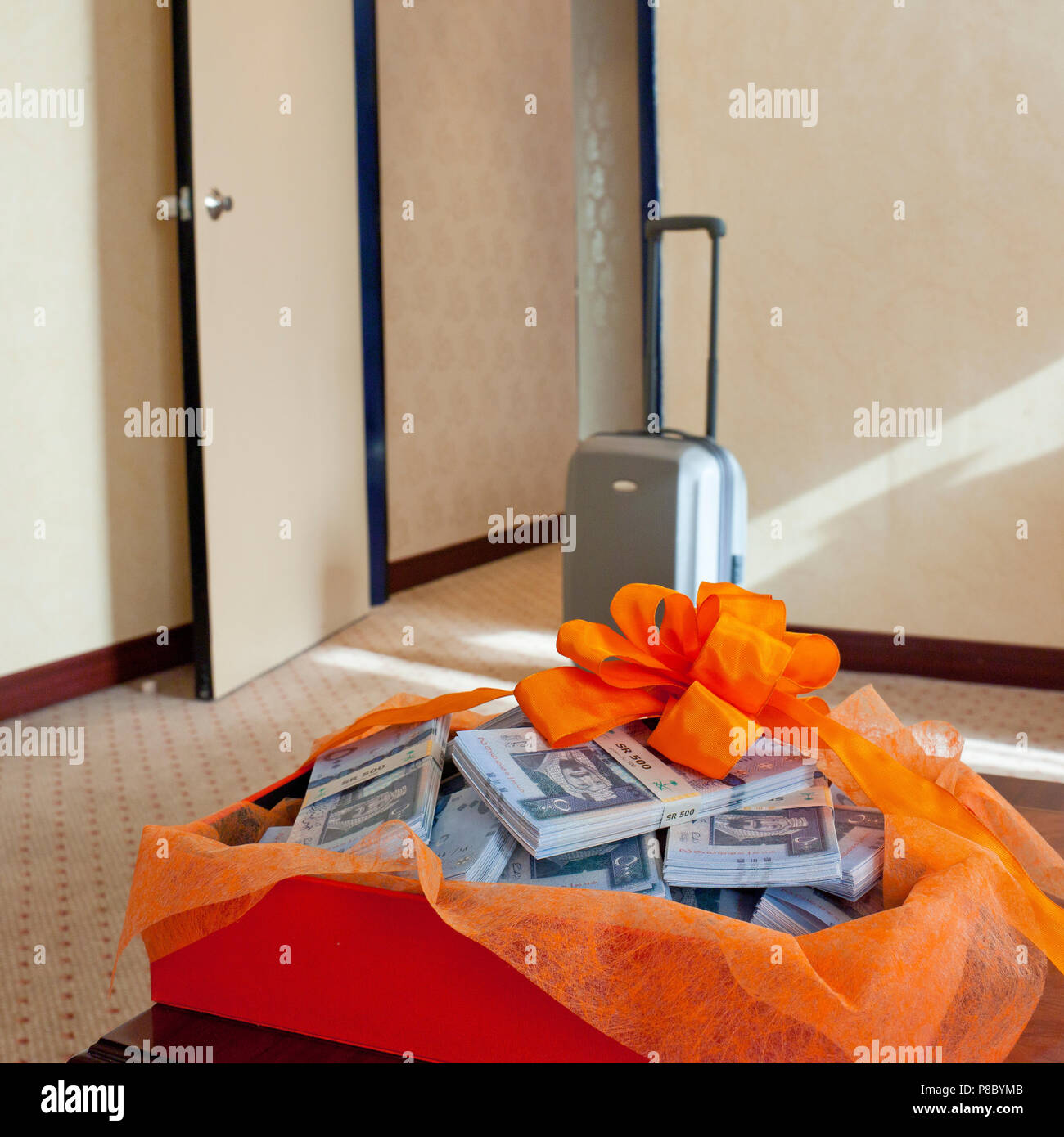 Cash prize, Stacks of Saudi Riyal banknotes on the side table at home ...