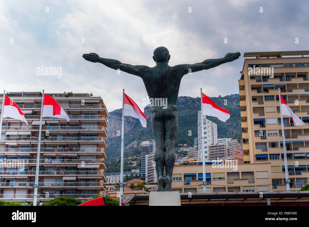 Olympic Plunge statue in monaco harbour Stock Photo - Alamy
