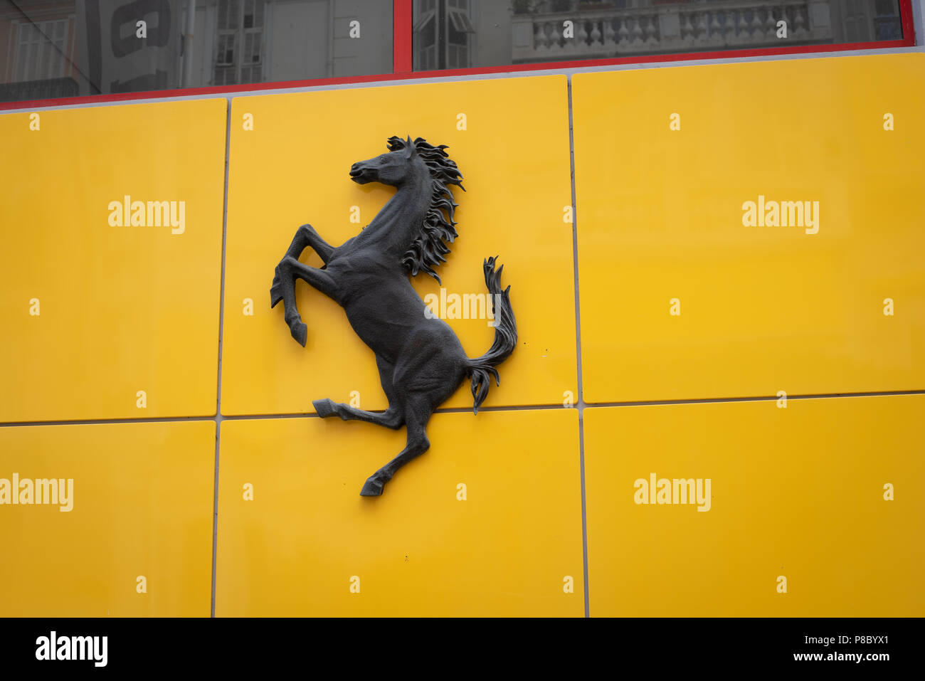 Ferrari logo on a garage in Monaco Stock Photo - Alamy