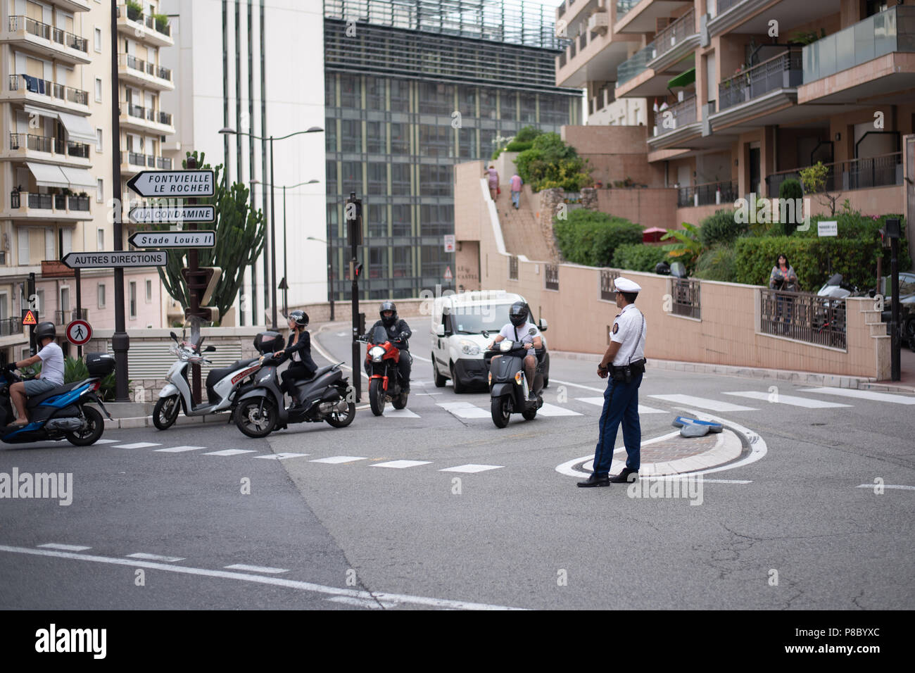 Policeman directing traffic in Monaco Stock Photo - Alamy