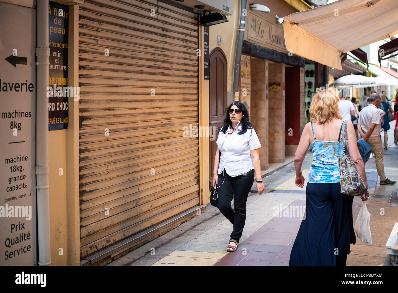 Locals on a street in Nice Old Town, France Stock Photo - Alamy