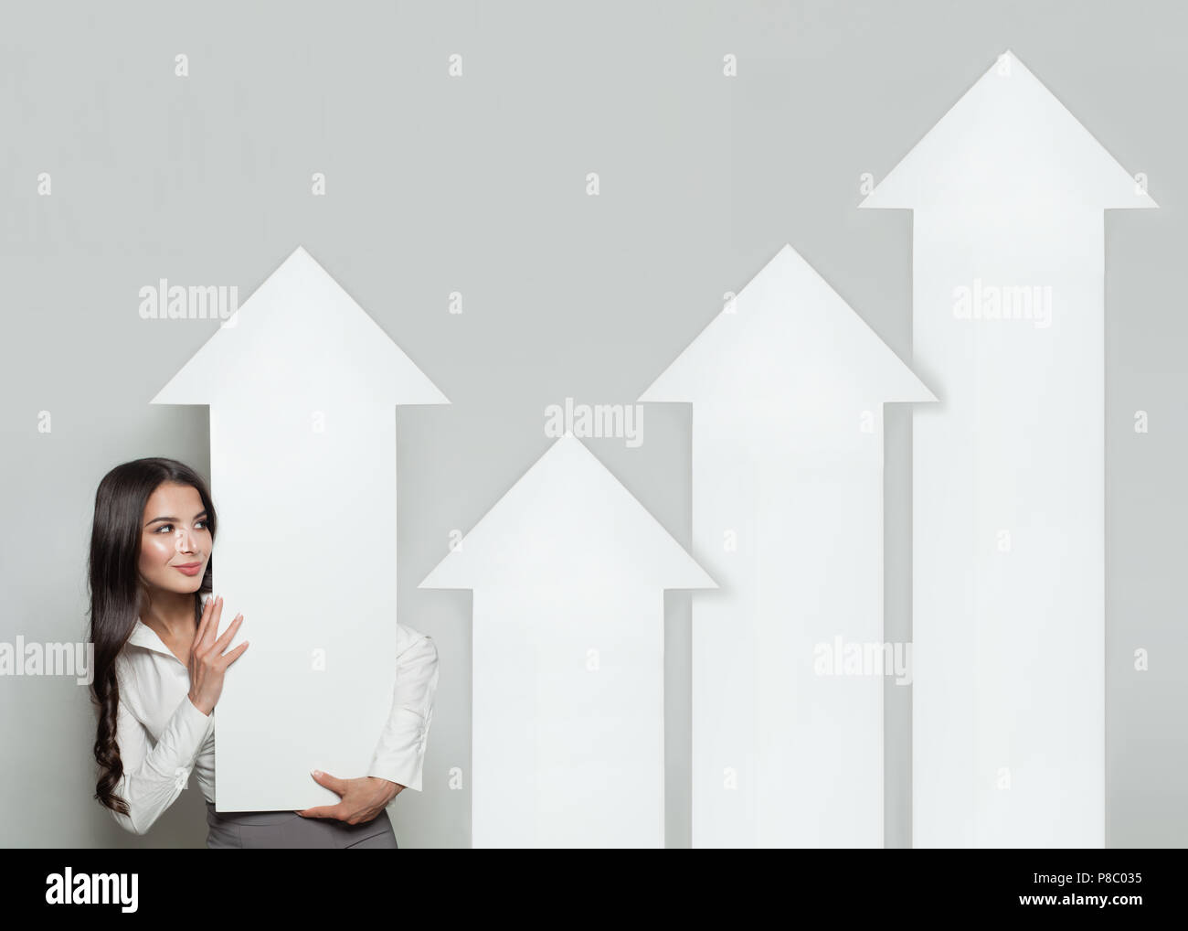 Business Manager with Rising Arrow Columns, Representing Business ...