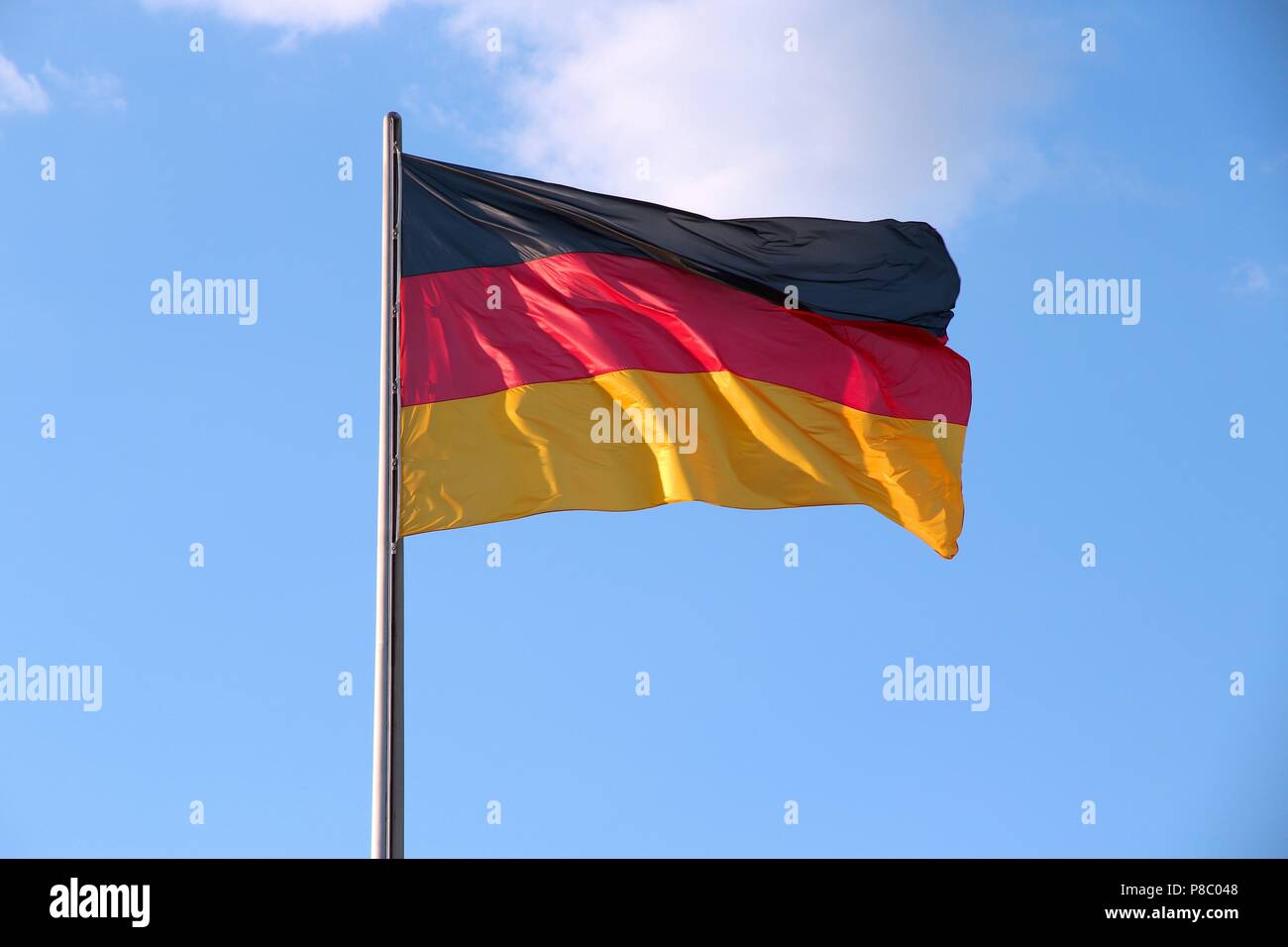 Flag of Germany - national symbol in the wind Stock Photo - Alamy