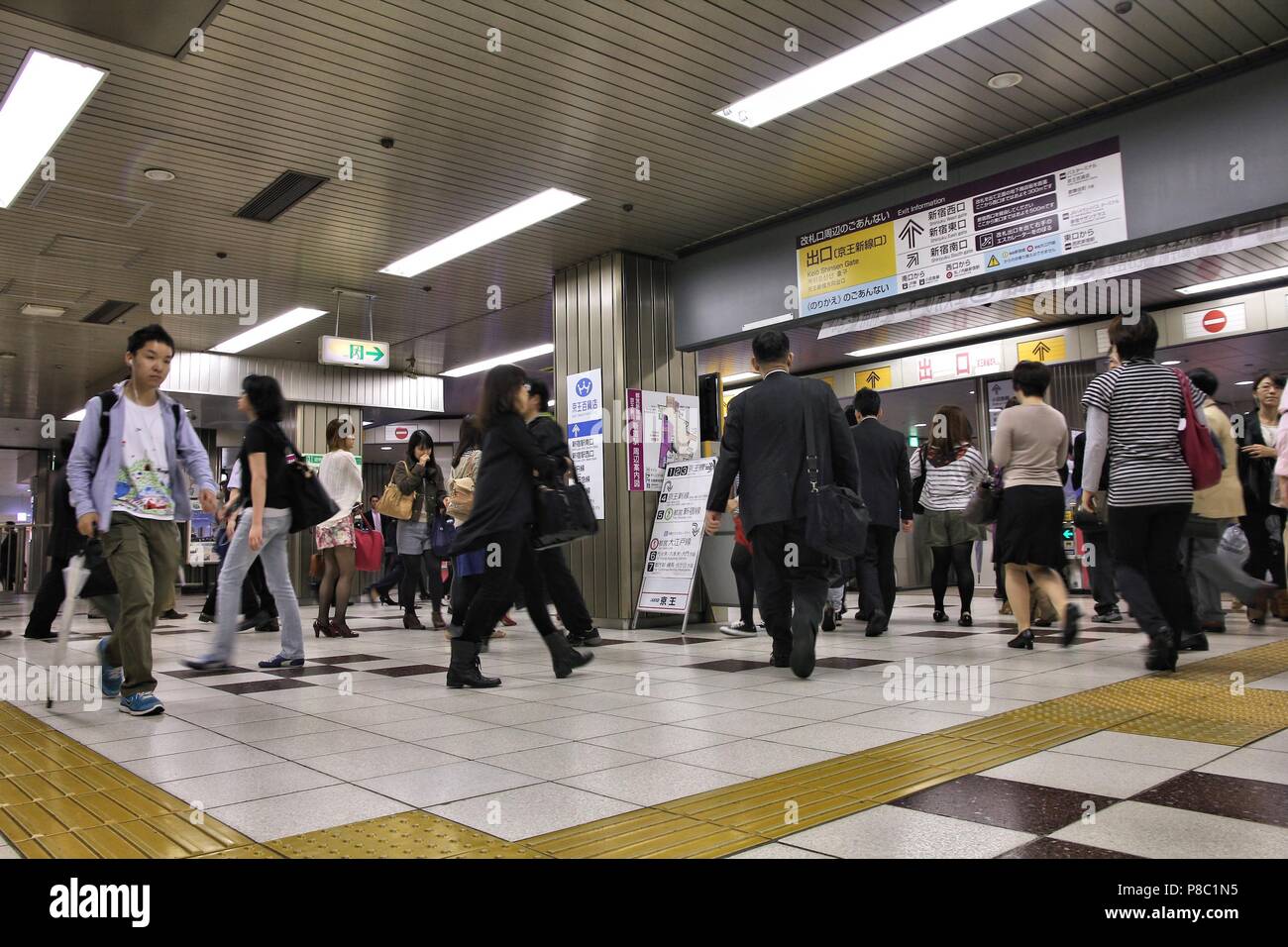 TOKYO, JAPAN - MAY 9, 2012: People enter Tokyo Metro station. With more ...