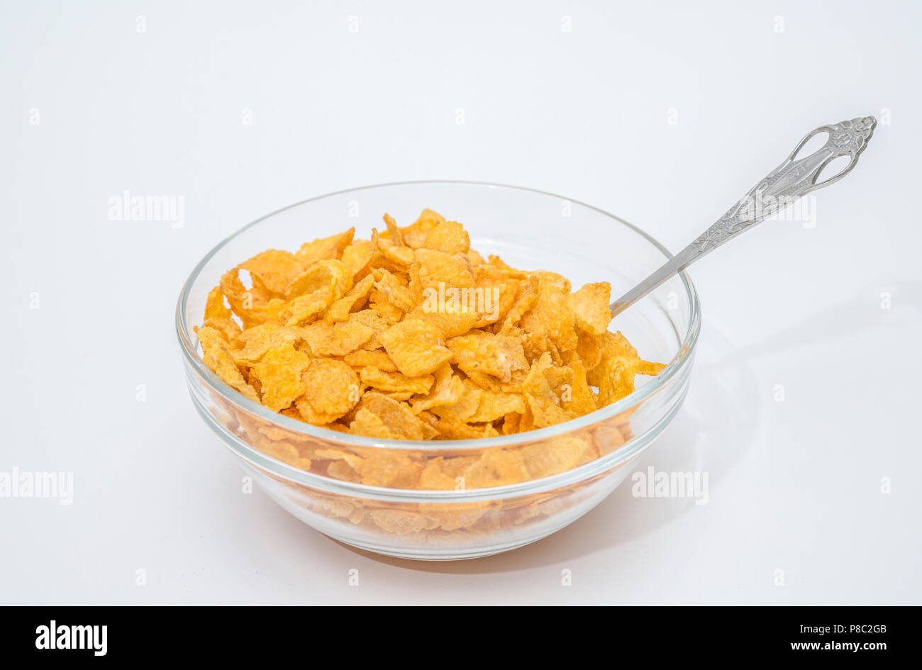 Cornflakes in white background Stock Photo - Alamy