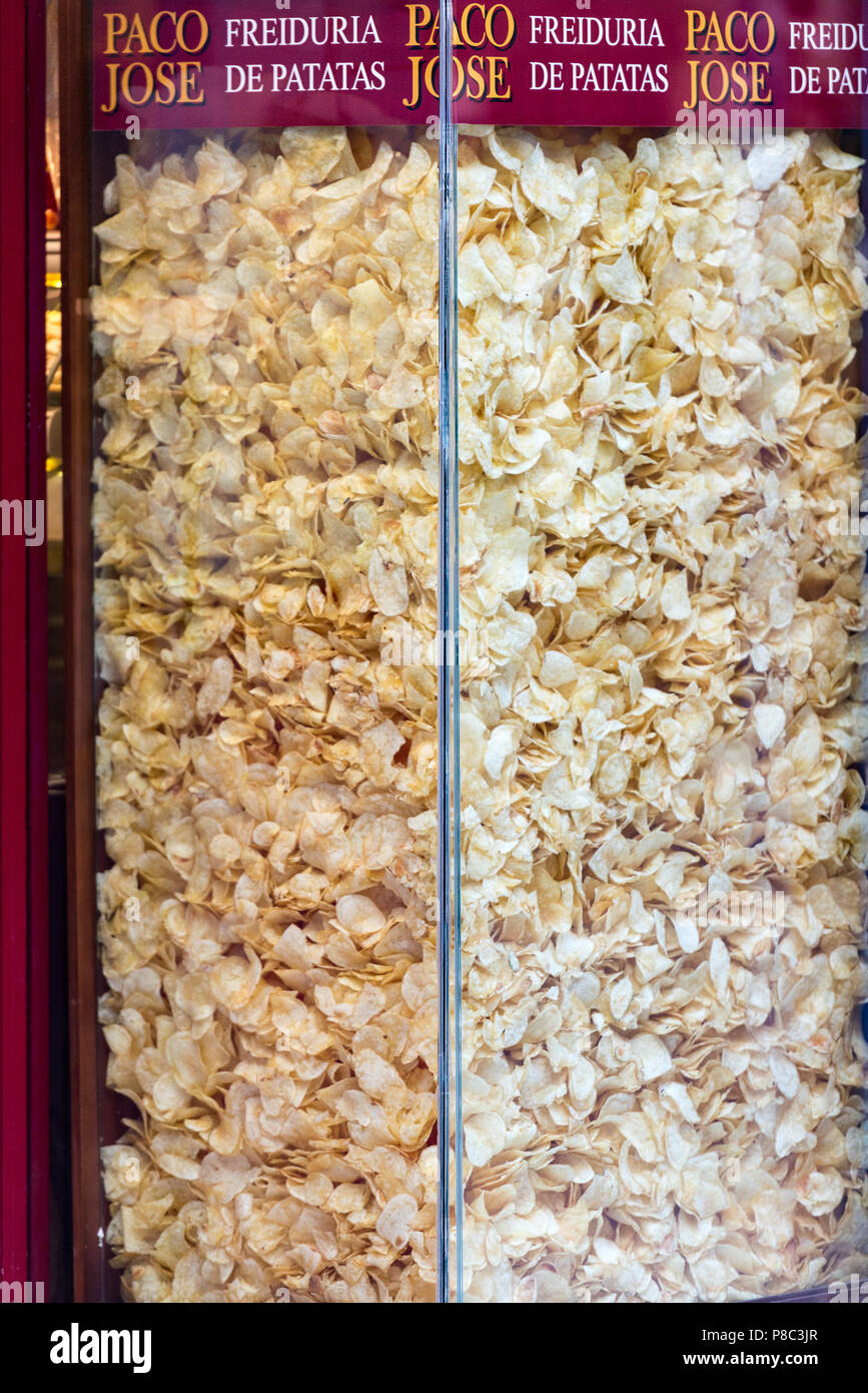 Showcase full of potatp chips in Malaga, Spain Stock Photo - Alamy