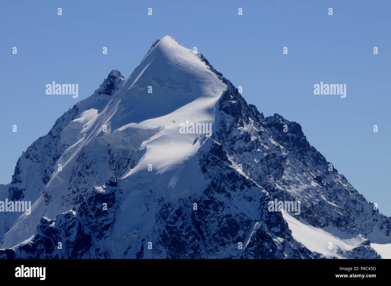 Swiss Alps: Piz Palü Peak, one of the highest mountains in the upper ...