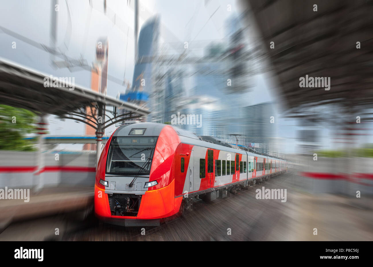 The electric train rushes at a high speed Stock Photo - Alamy