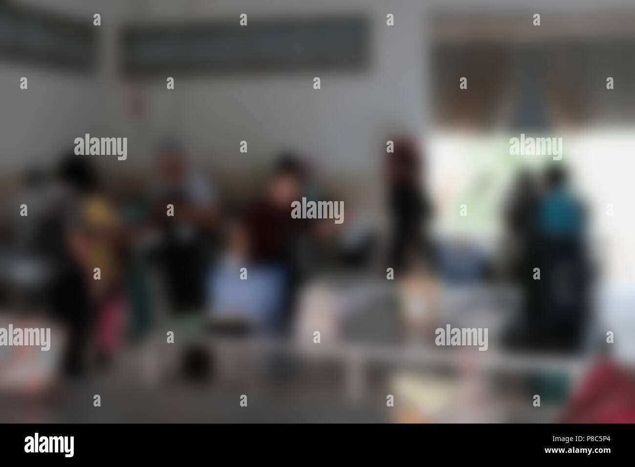 restaurant kitchen. people in food preparation room. blurry defocused ...