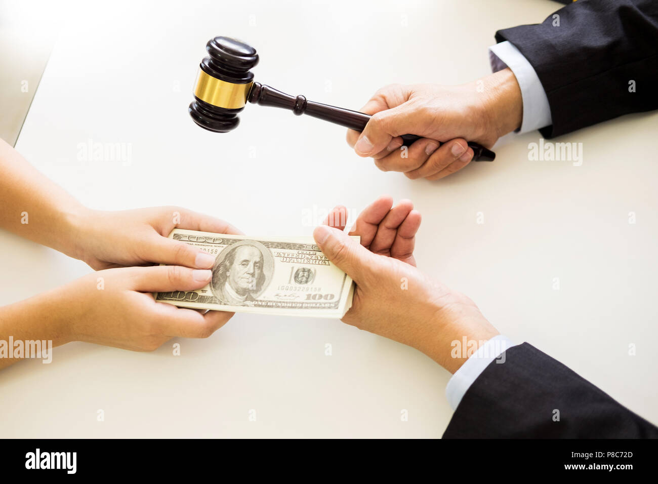 Lawyer receiving money as bribe hi-res stock photography and images - Alamy