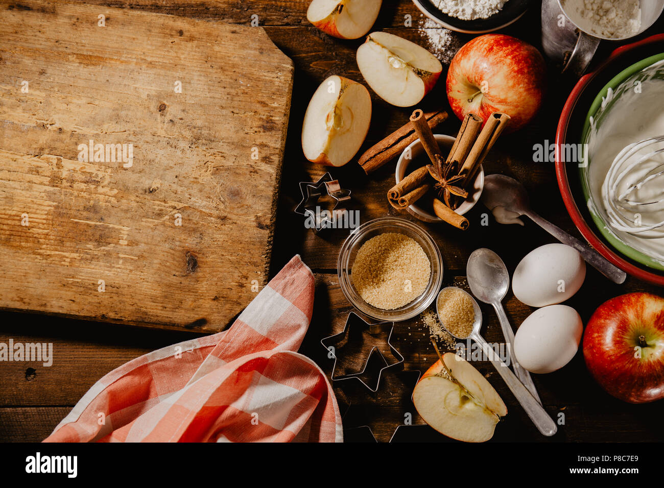Baking concept of autumn apple pie. View from above on kitchen table ...