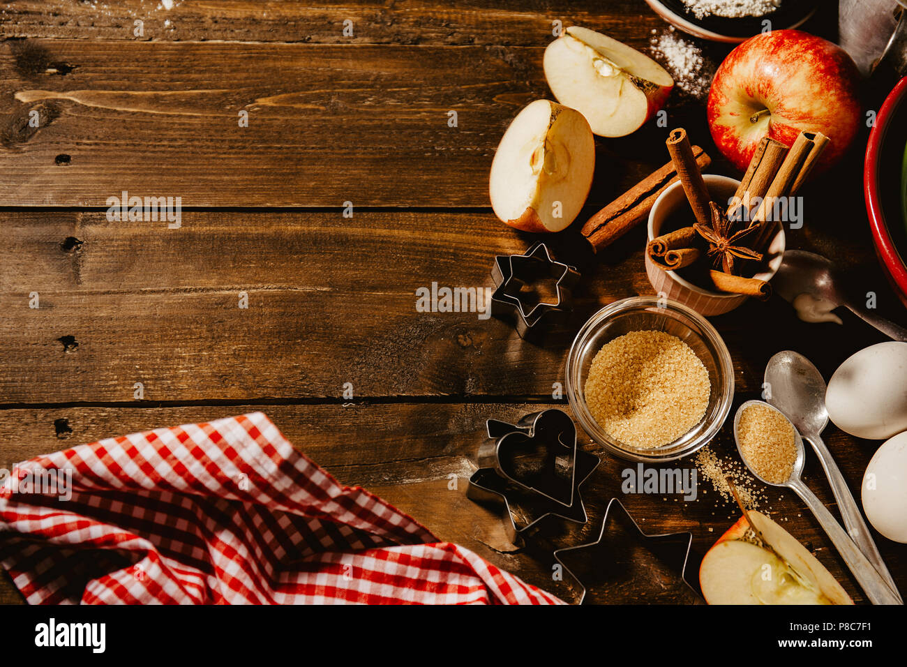 Baking concept of autumn apple pie. View from above on kitchen table ...