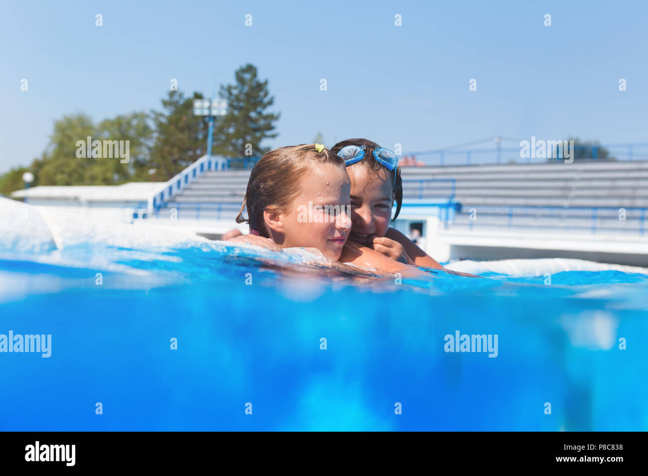 Children enjoying water play hi-res stock photography and images - Alamy