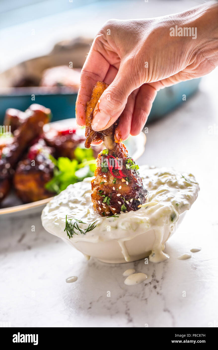 French chicken drumstick hand hi-res stock photography and images - Alamy
