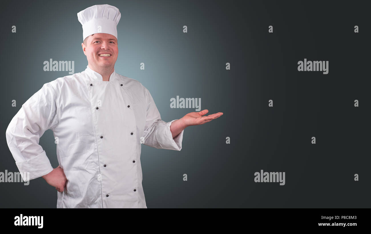Chef presents something Stock Photo - Alamy