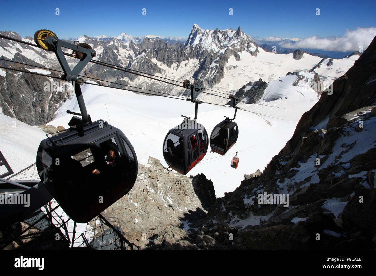 The cable car reaches the top station at the Aiguille-du-Midi in the ...