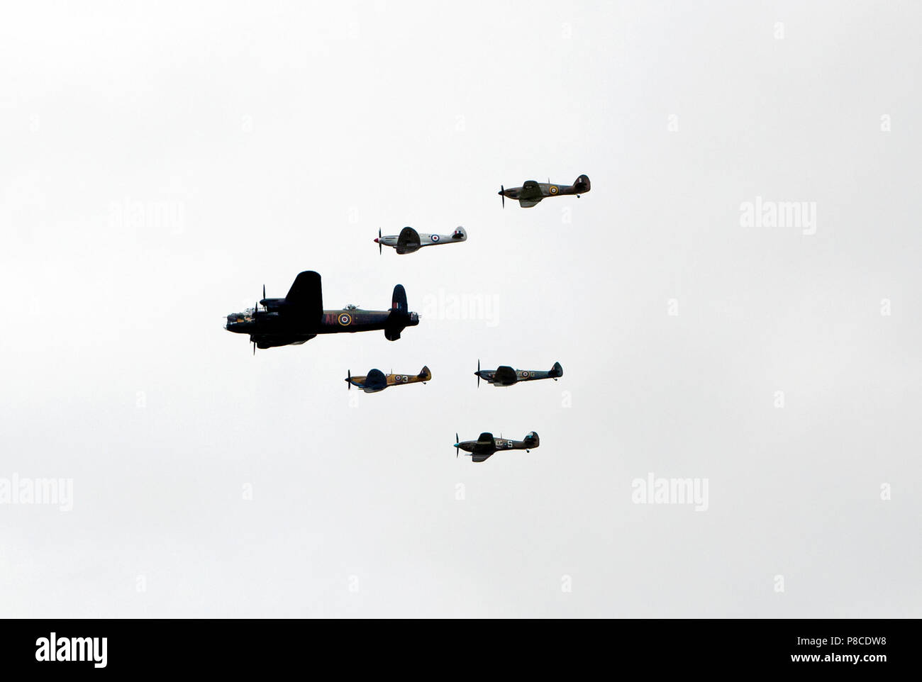 Lancaster, Hurricane and Spitfire Aircraft fly in formation over the ...