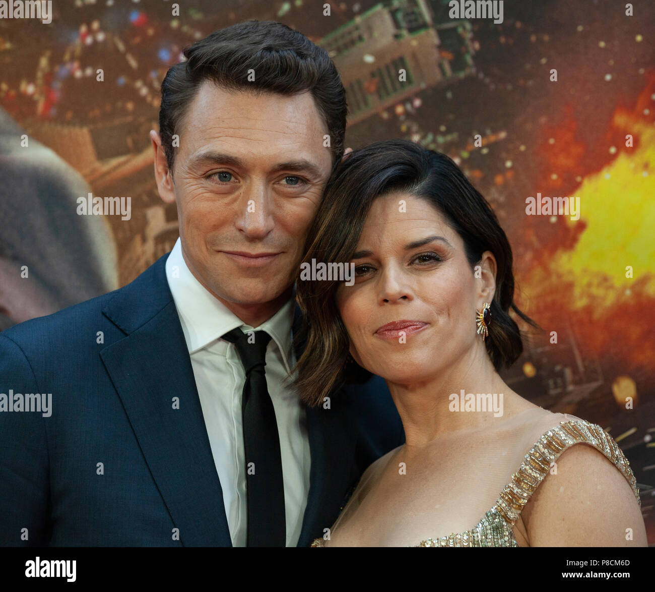 New York, NY - July 10, 2018: JJ Field & Neve Campbell wearing dress by ...