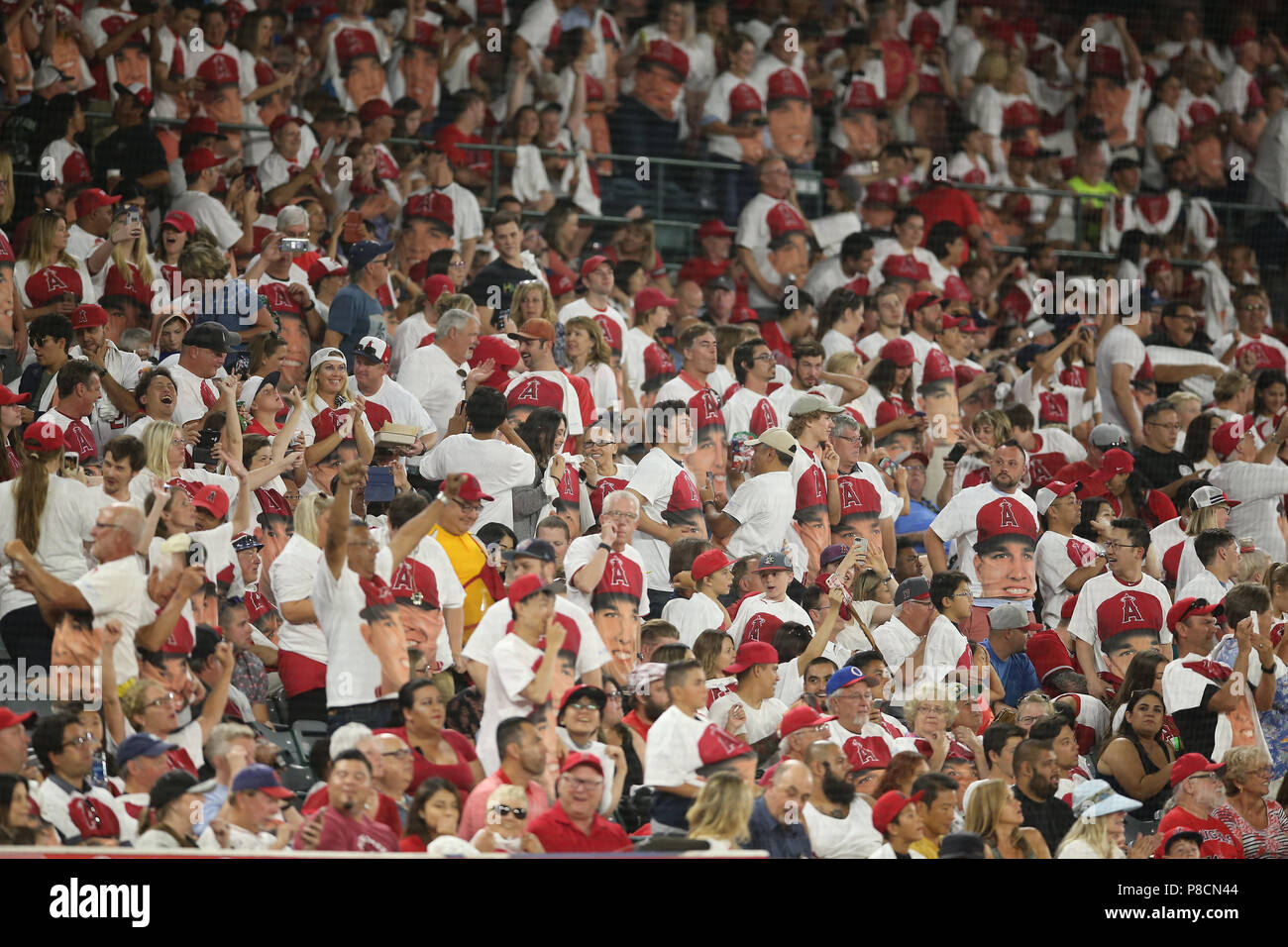 Anaheim, USA. July 10, 2018: Fans wear Mike Trout giveaway shirts in ...