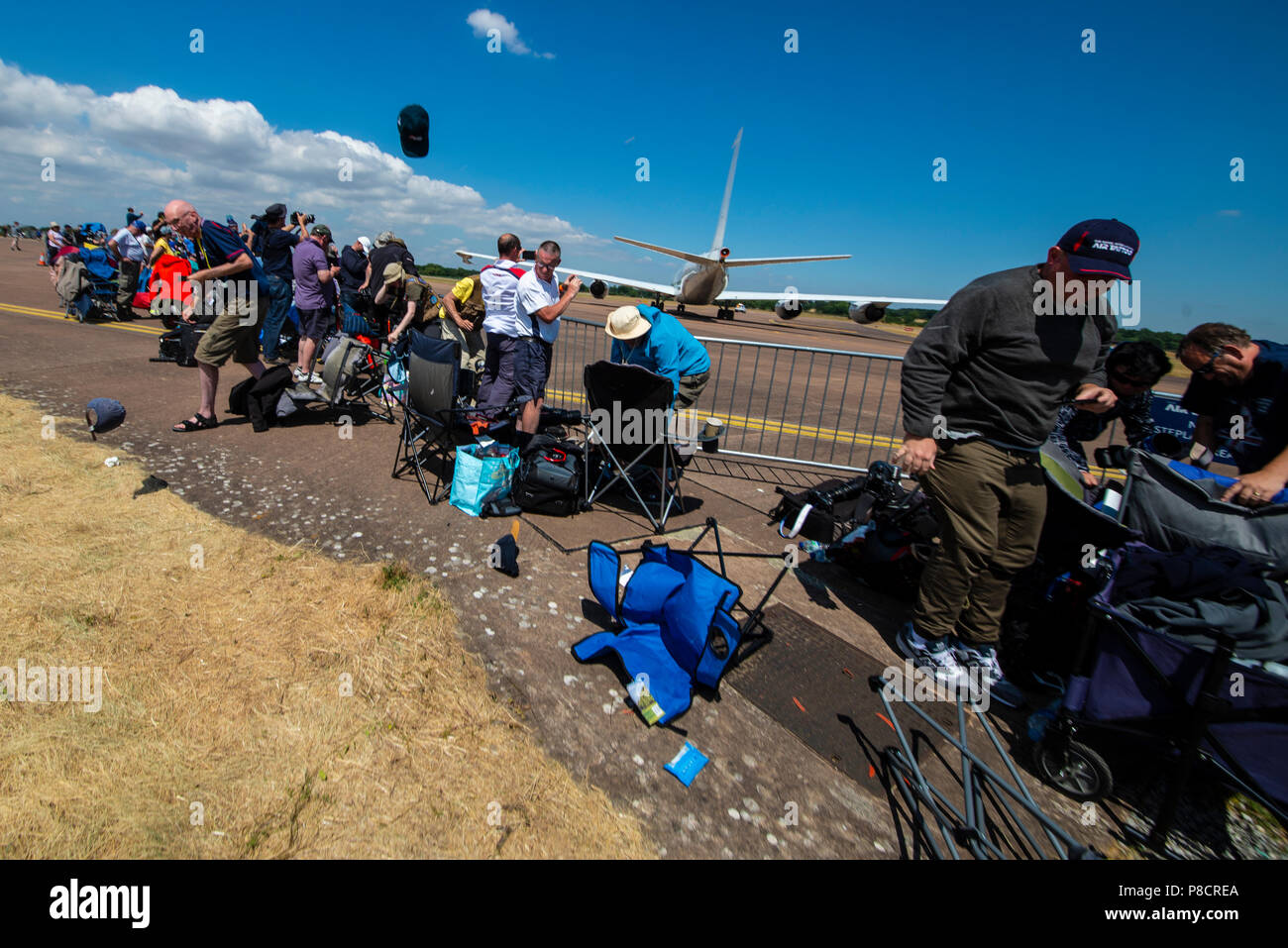 US Navy E6 Mercury jet plane blowing jet efflux into the crowd, blowing ...