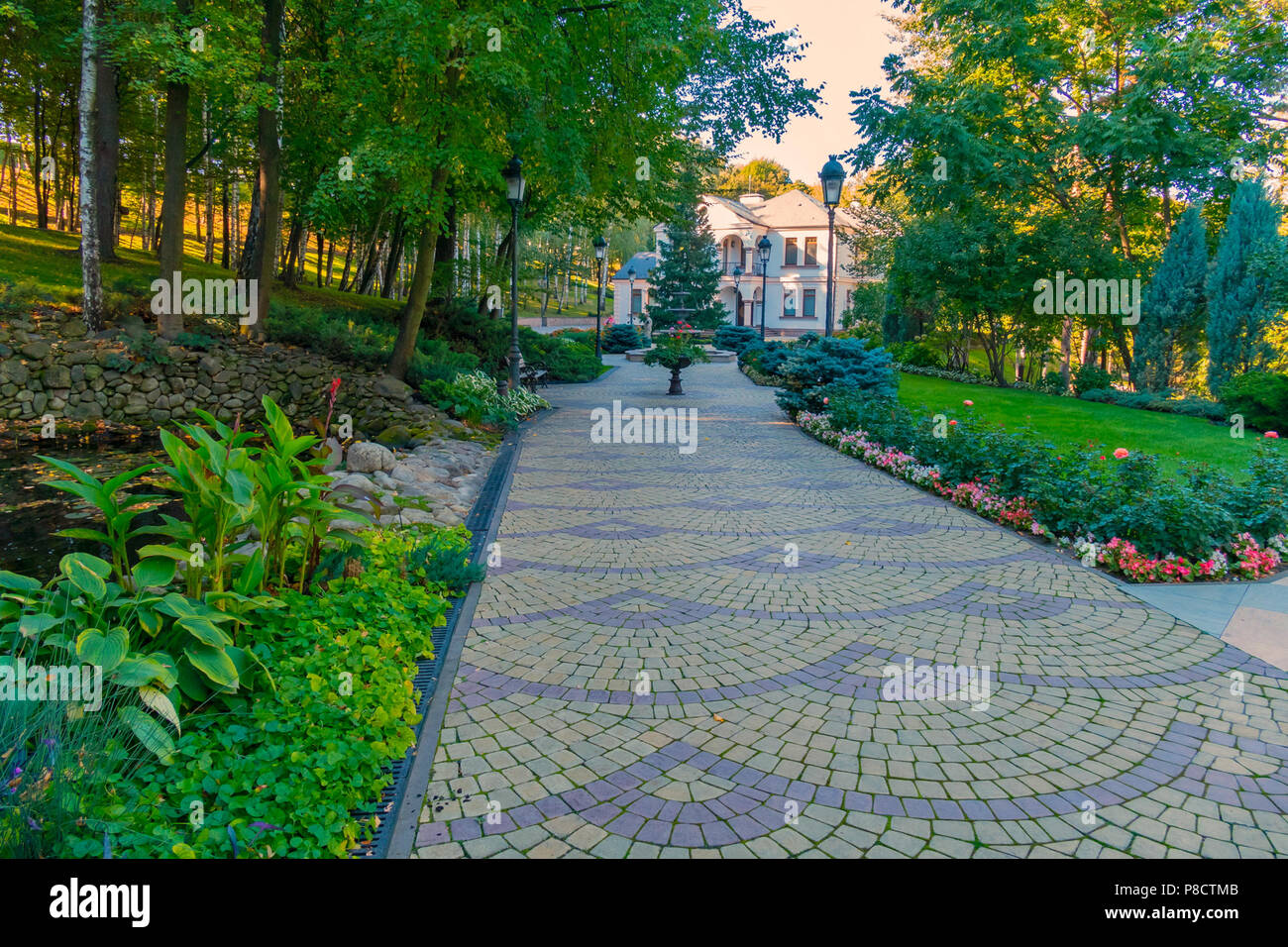 openwork pattern on the lantern path in the park near the house . For your design Stock Photo ...