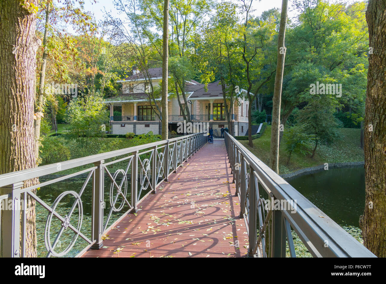 cities with metal railings through the river to the beautiful garden ...