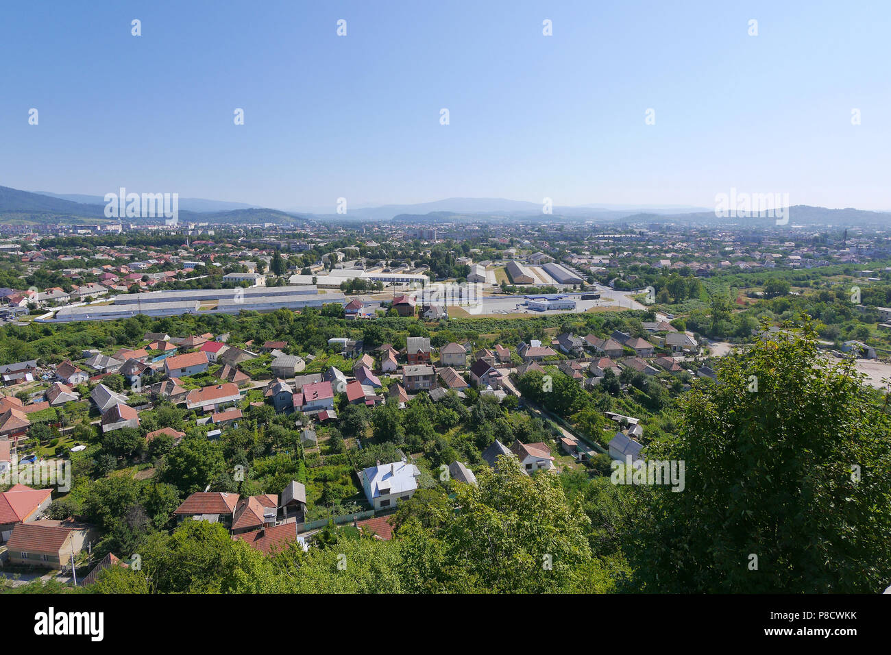 a panorama of red roofs of the city of Mukachevo and far hills from the ...