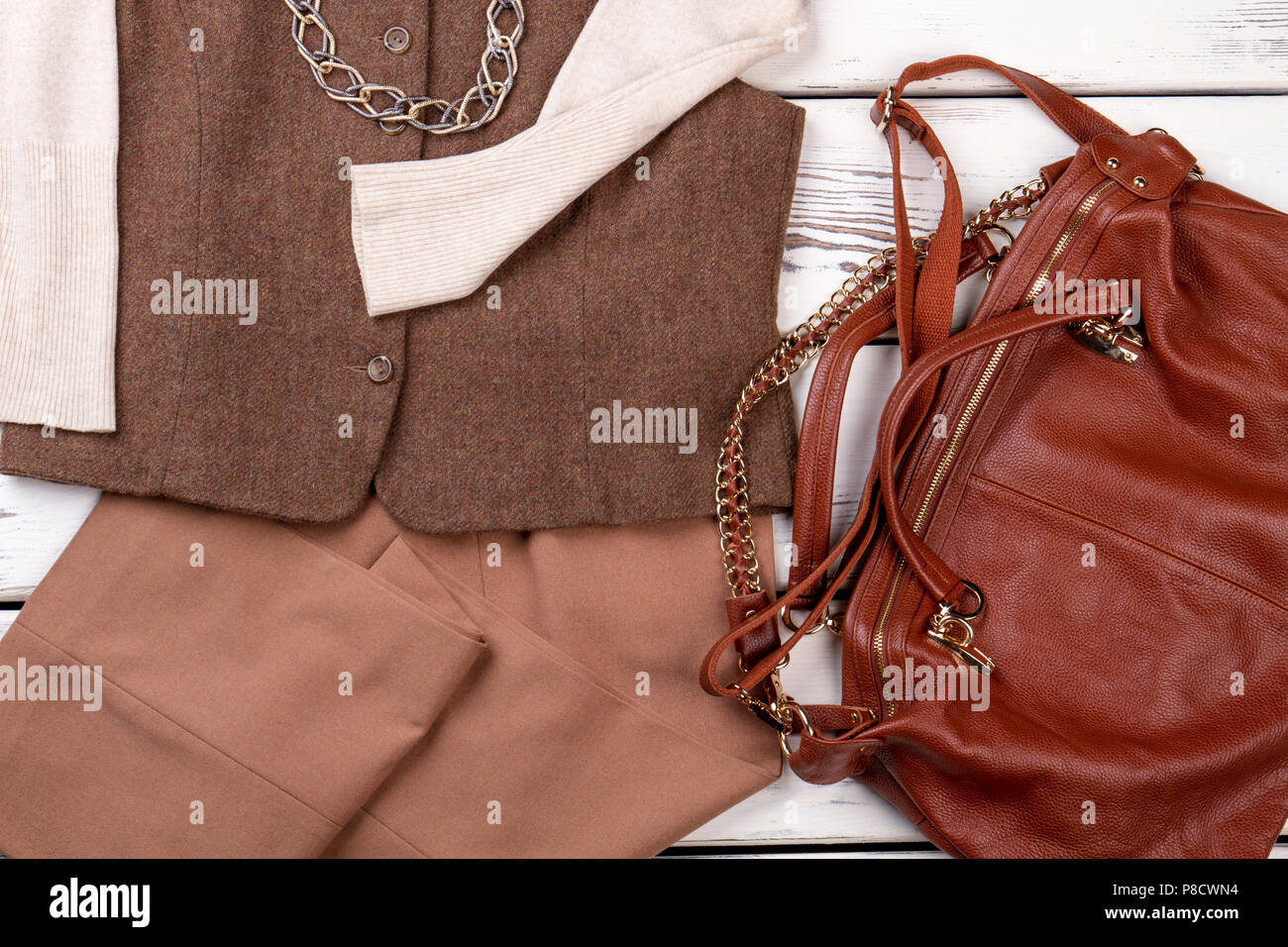 Folded coat and bag hi-res stock photography and images - Alamy