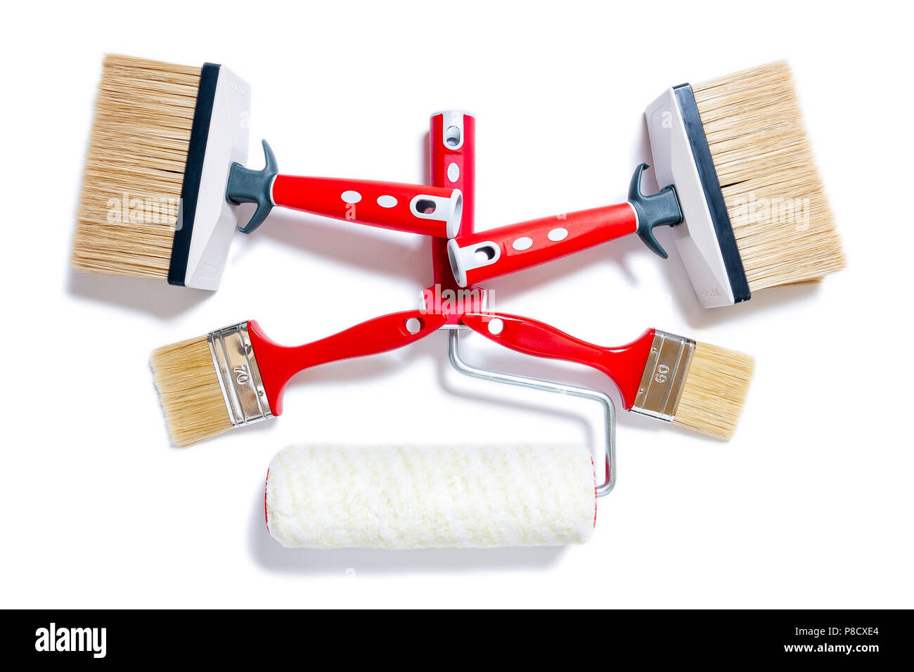 Top view of brushes and roller for professional house painter ...