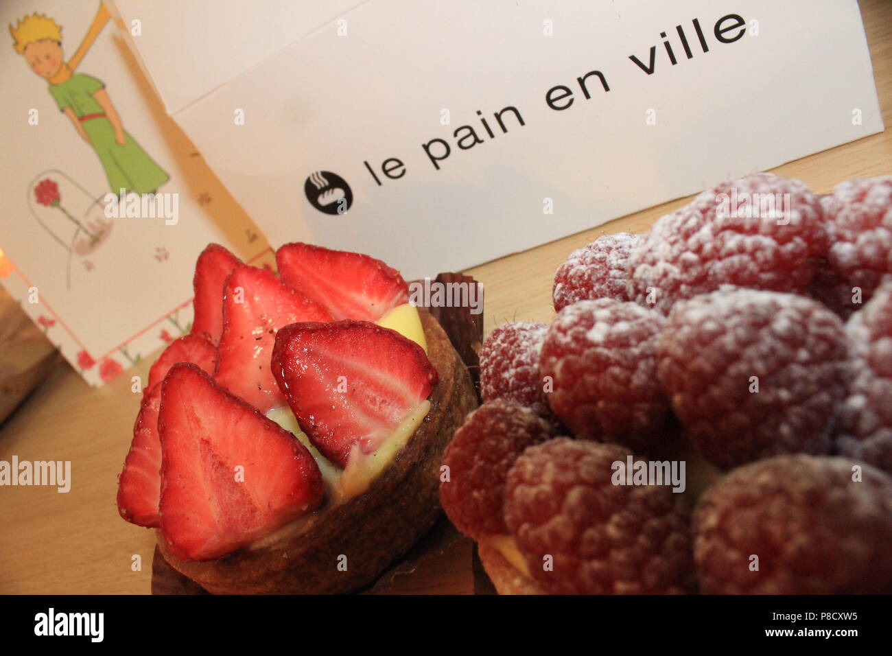 Red Fruit French Cakes in Paris Stock Photo - Alamy