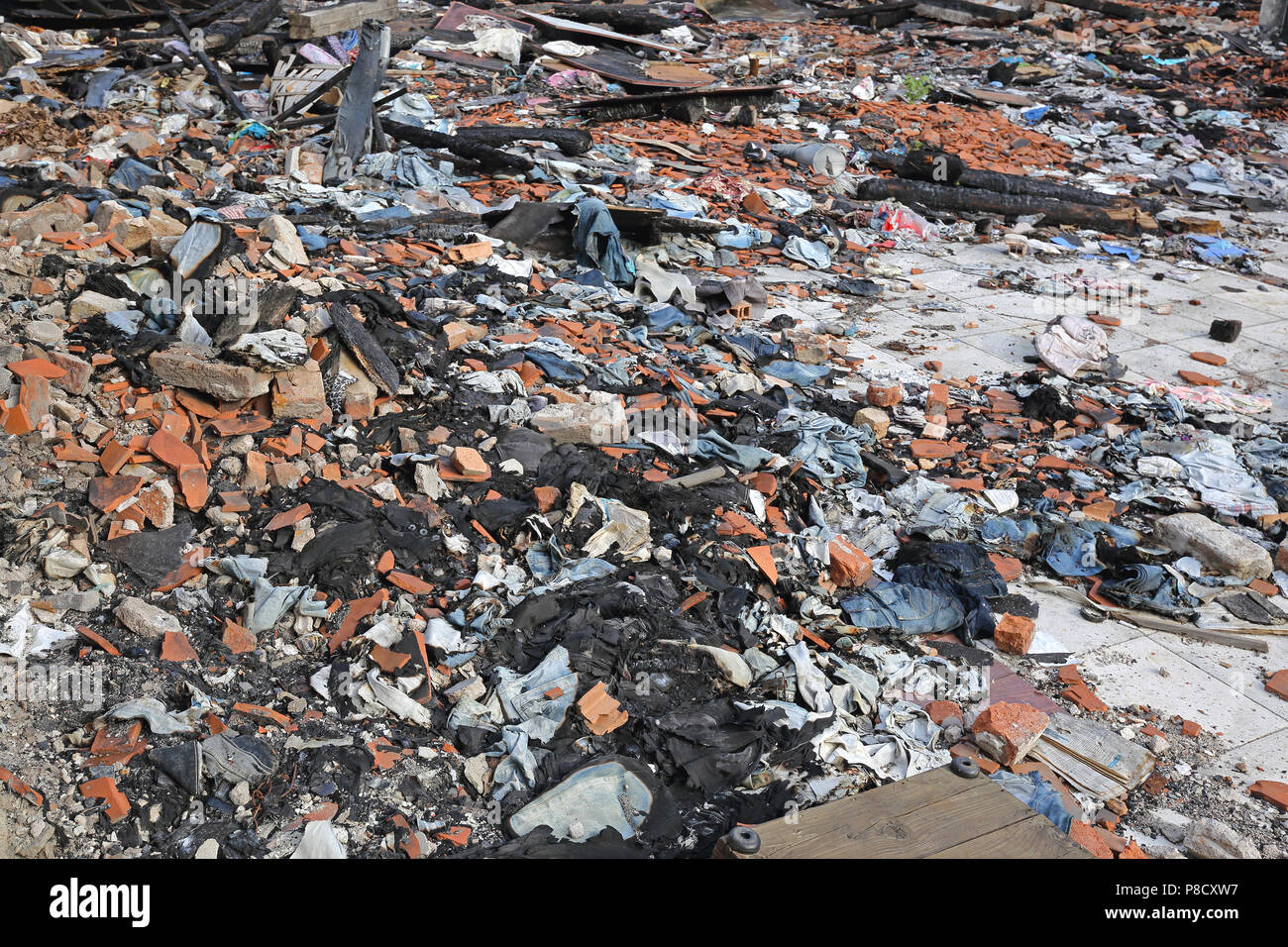 Scattered Debris in Garment Factory After Fire Damage Stock Photo - Alamy