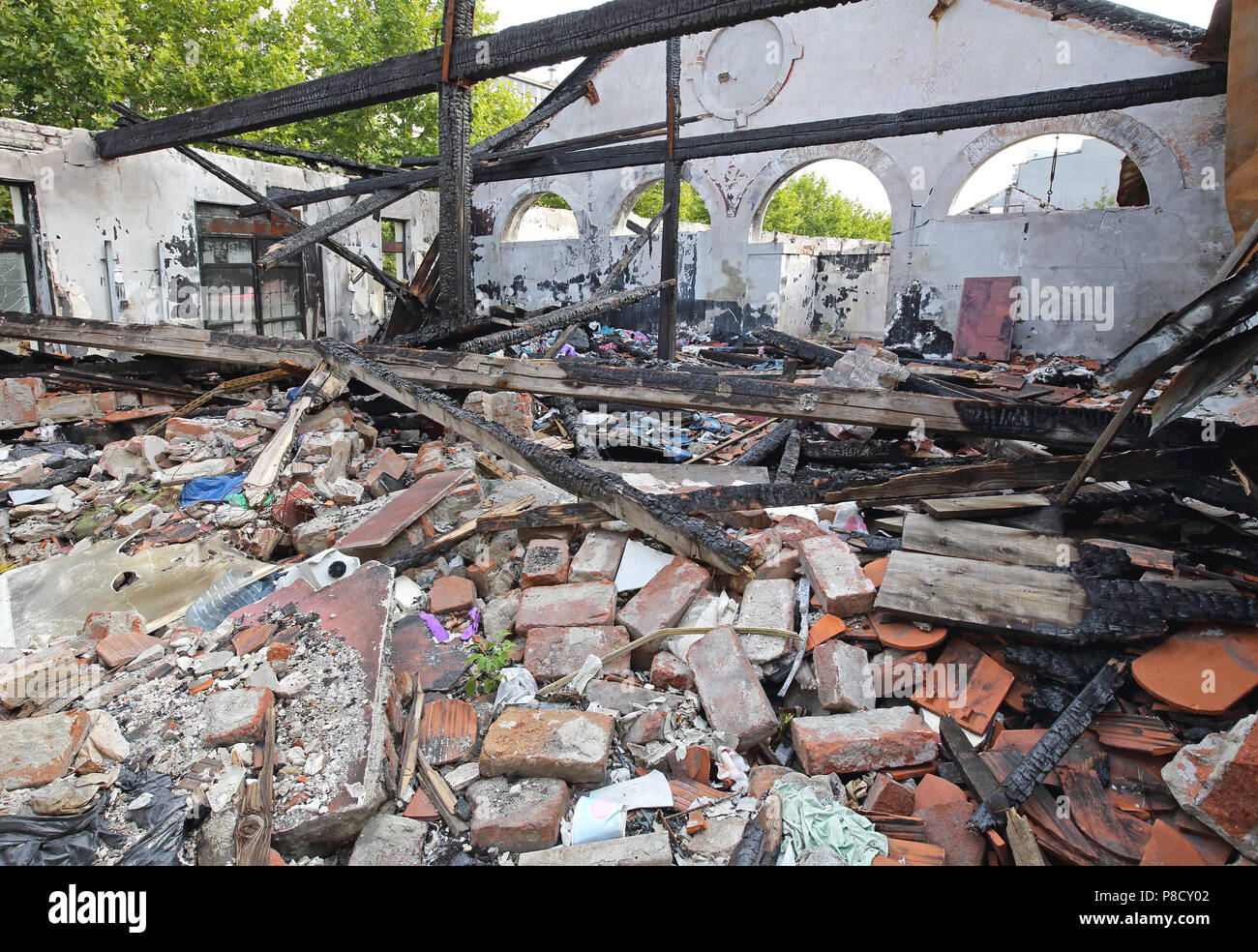 Collapsed Roof and Burned Wooden Beams in Factory After Fire Stock ...
