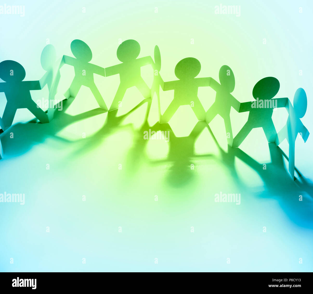 Team of paper chain people Stock Photo - Alamy