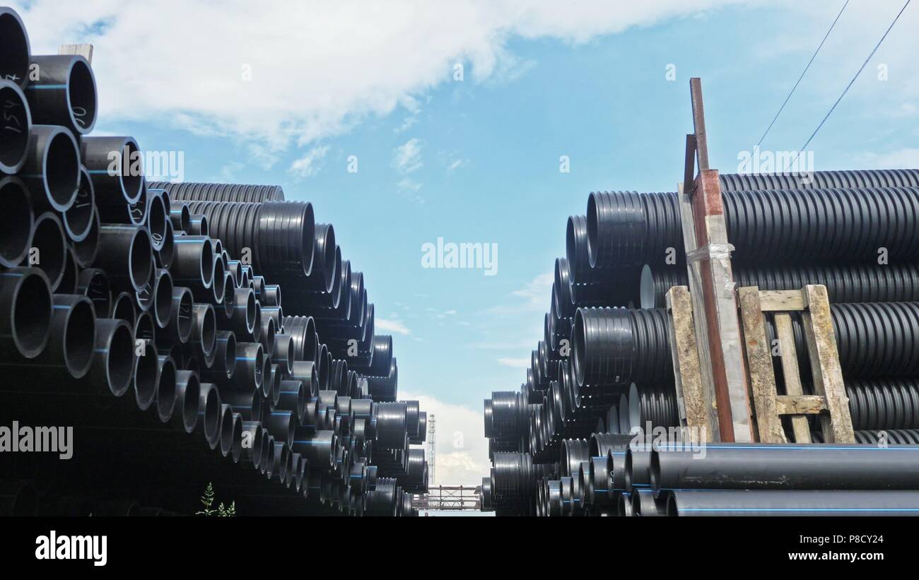 Warehouse of finished plastic pipes industrial outdoors storage site ...