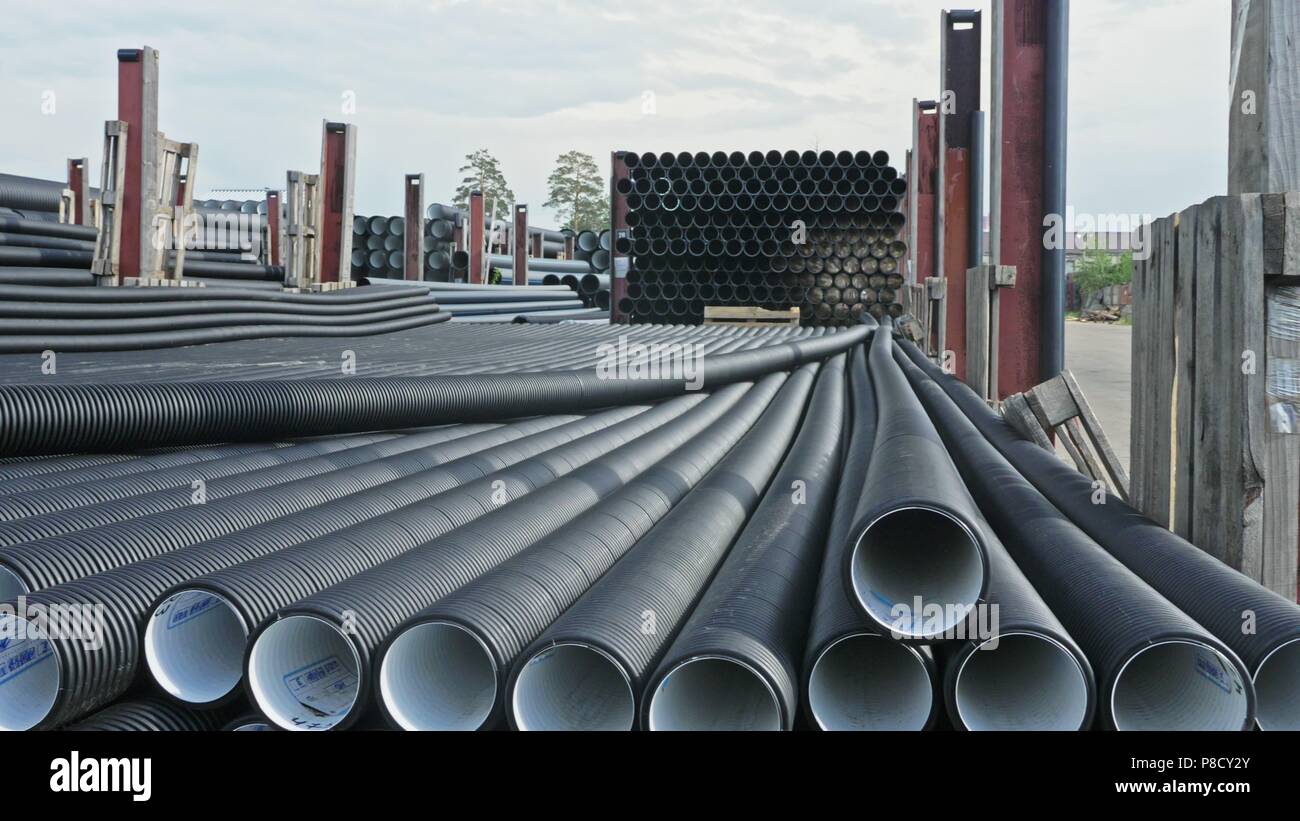Warehouse of finished plastic pipes industrial outdoors storage site ...