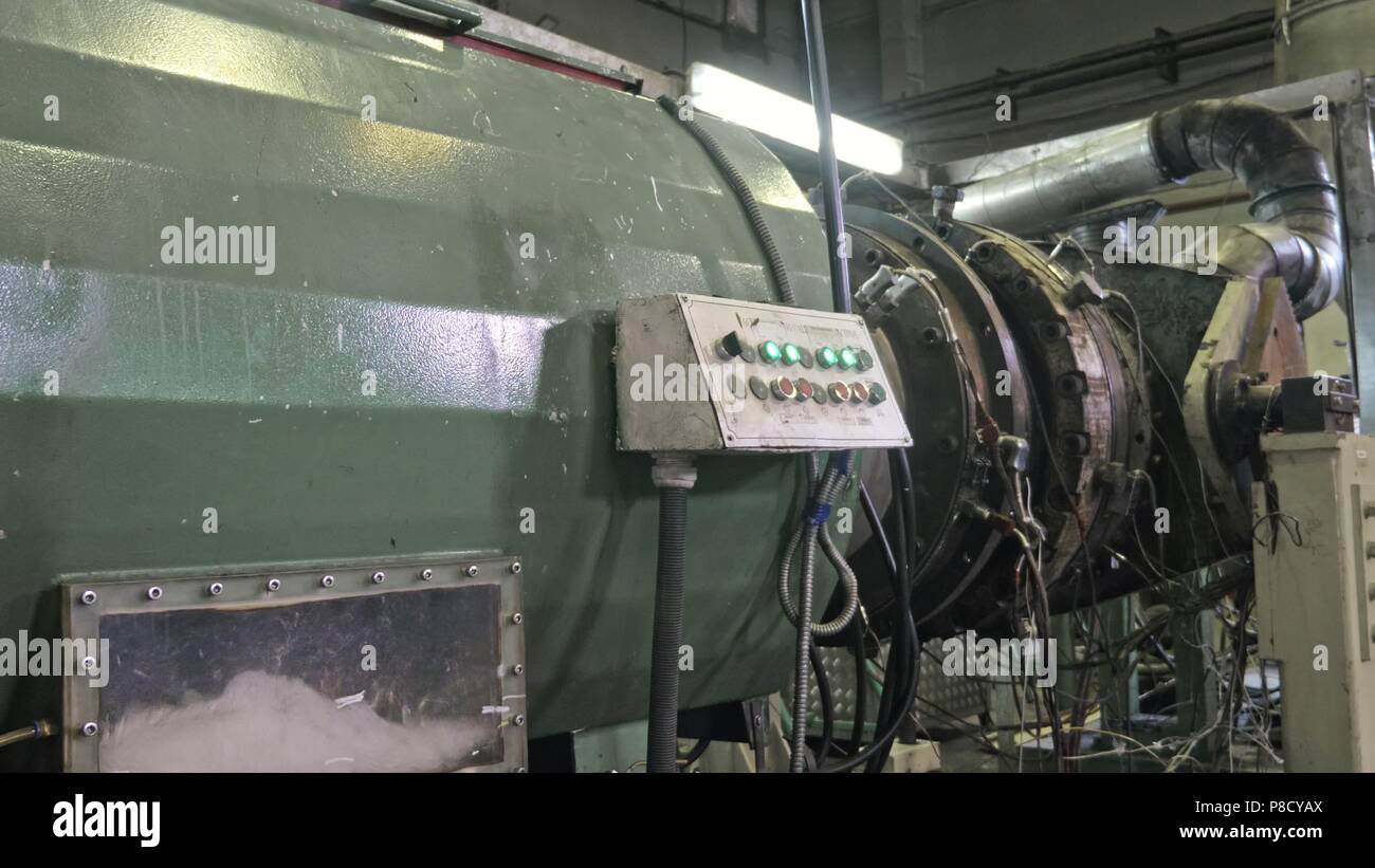 Pipes manufacturing production line. Manufacture of plastic water pipes ...
