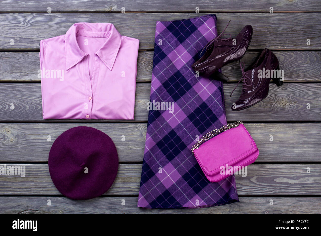 Flat lay set of purple women's clothing Stock Photo - Alamy