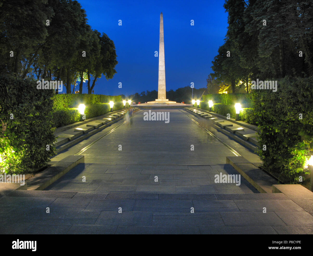 Illuminated lantern alley, running along memorial plates to a huge ...