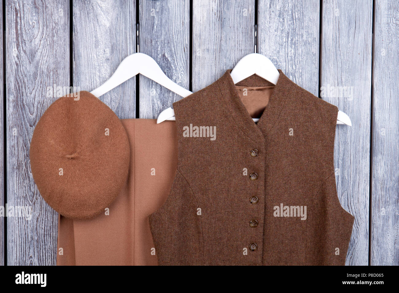 Brown winter woman clothing set Stock Photo - Alamy